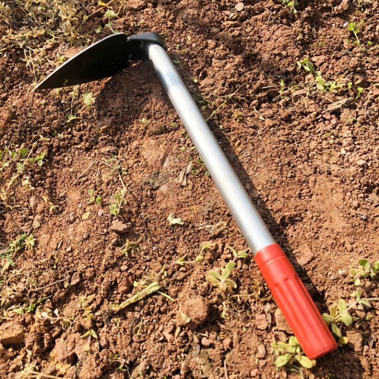 Loose soil and weeding garden hoe